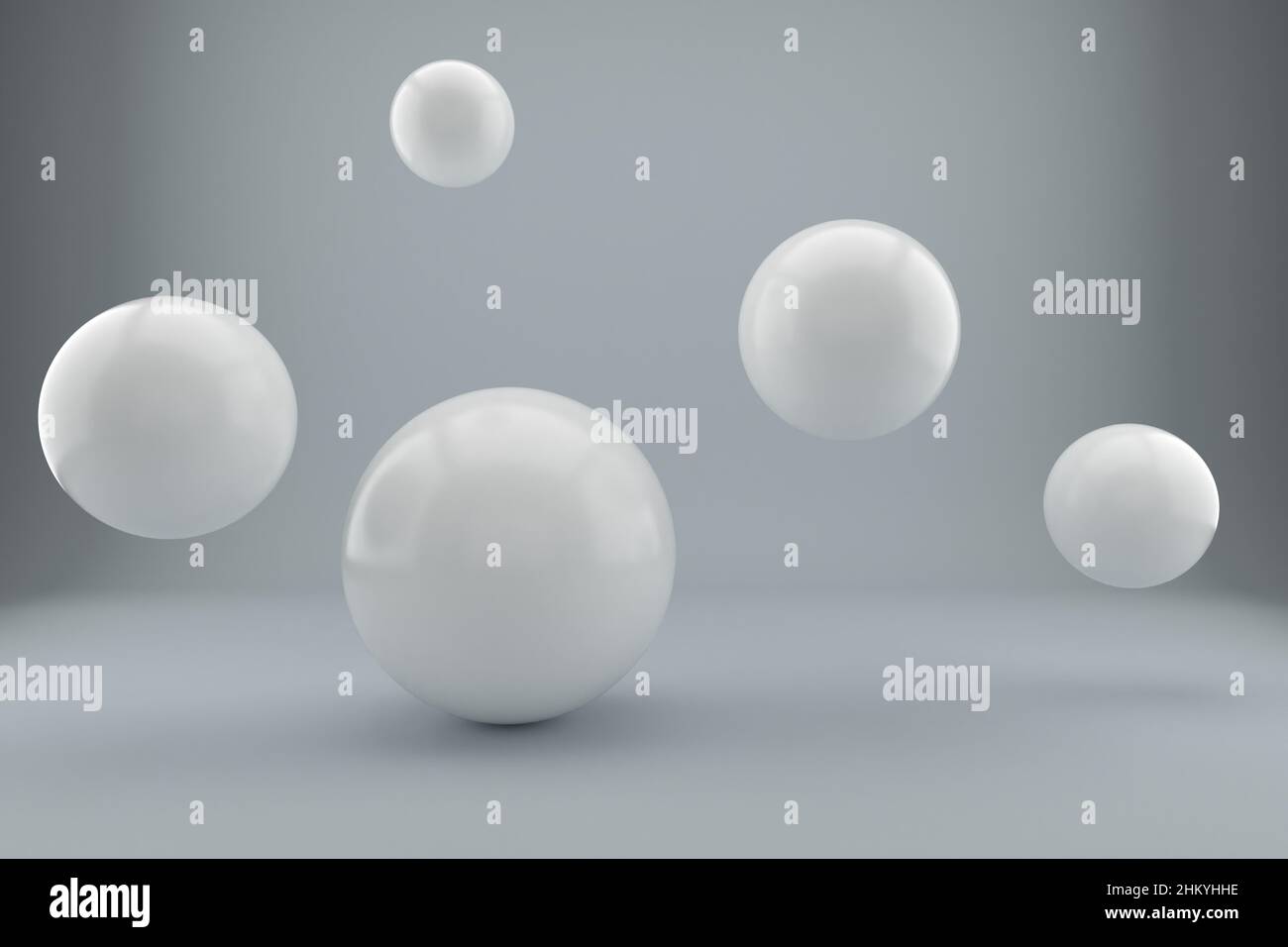 3d rendering of several sized reflected white spheres inside a white ...