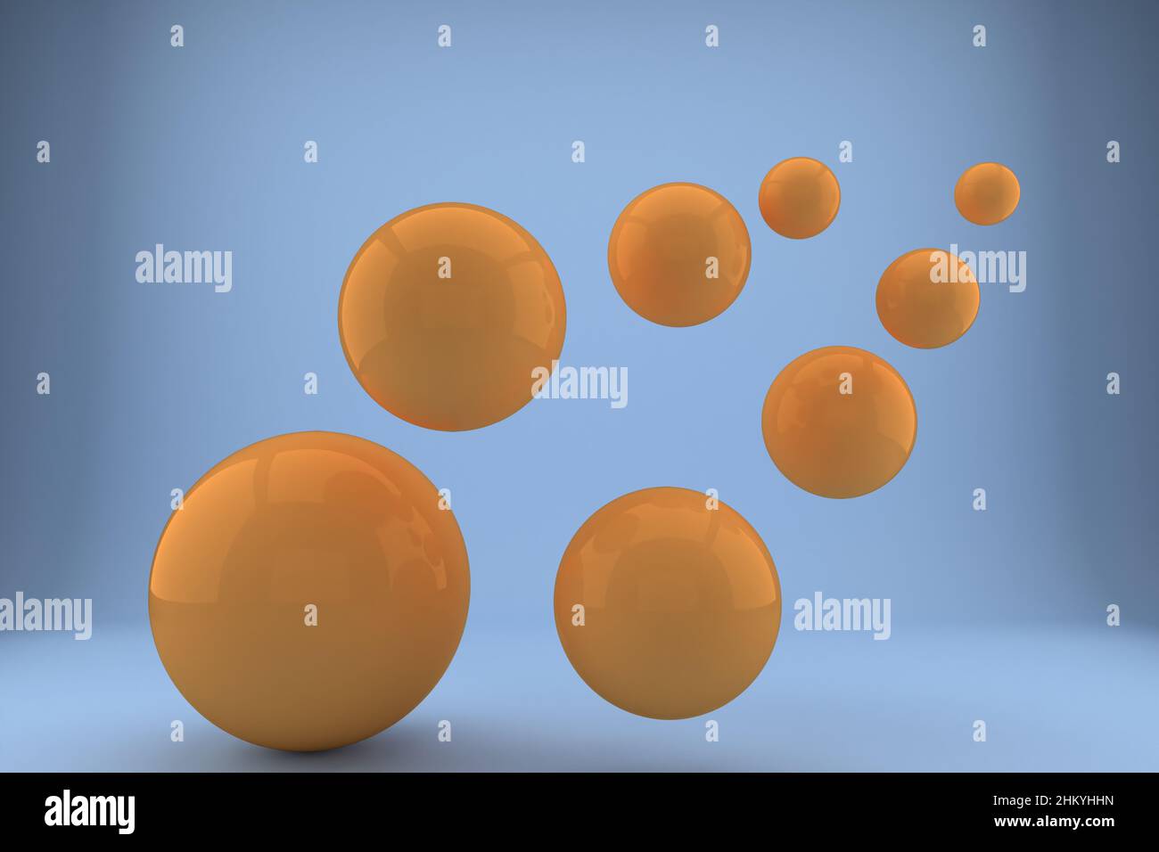 3d rendering of several sized reflected yellow spheres inside a blue ...
