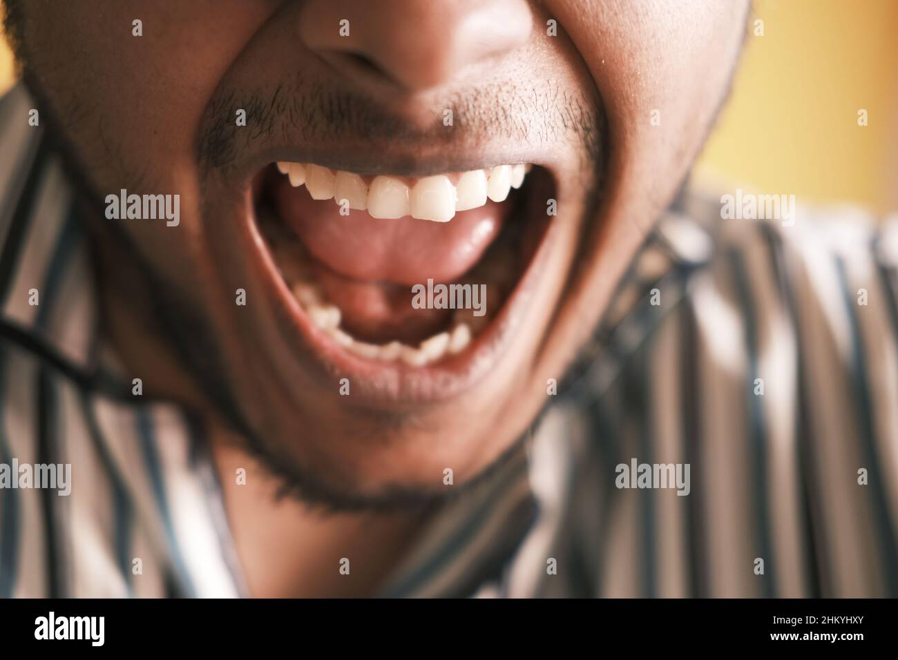 young man screaming at camera Stock Photo - Alamy