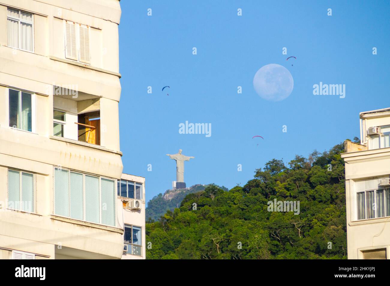Christ the Redeemer and the Moon seen from Copacabana in Rio de Janeiro ...