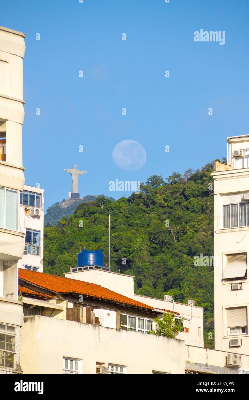 Christ the Redeemer and the Moon seen from Copacabana in Rio de Janeiro ...