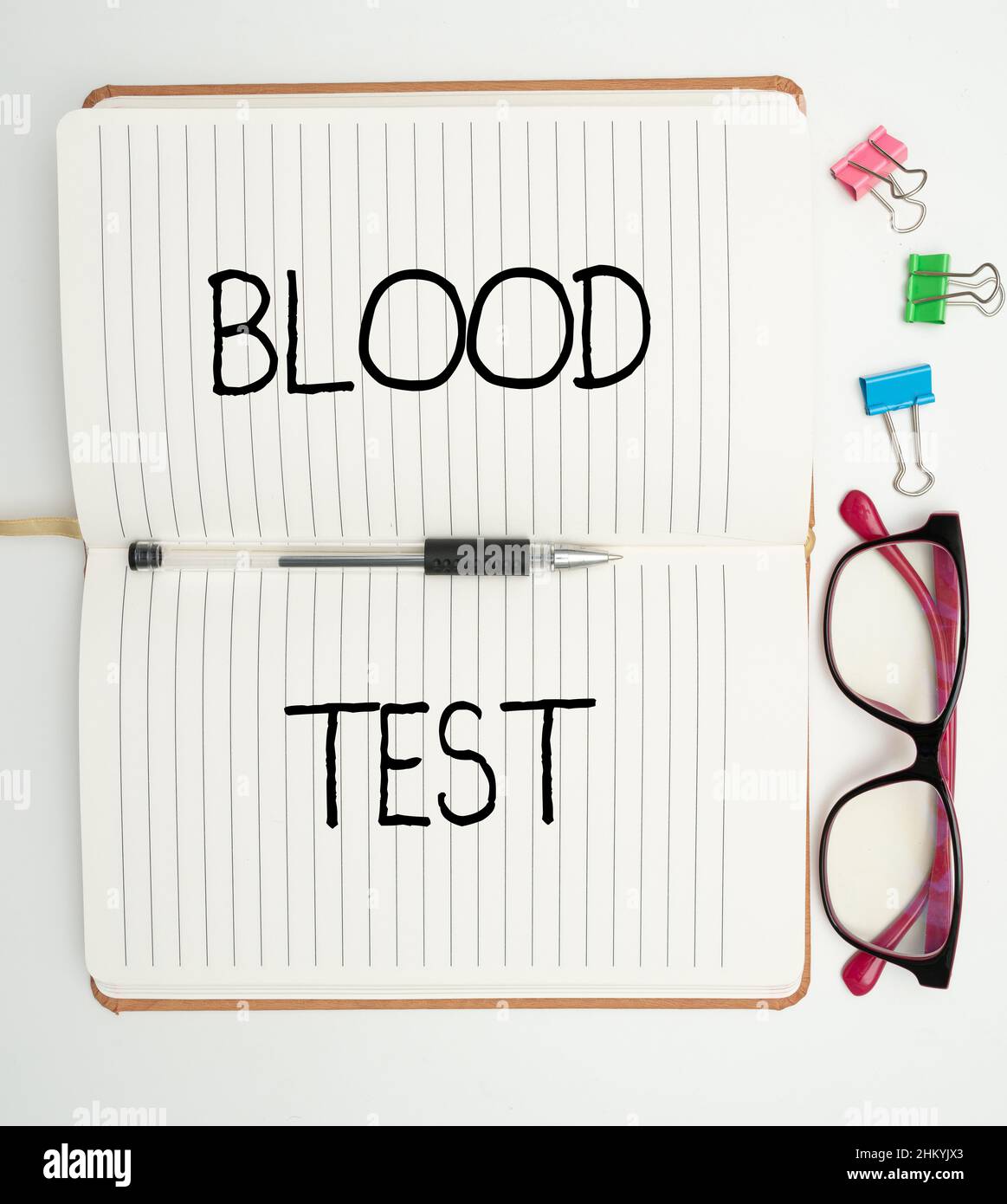 Handwriting text Blood Test. Business approach Extracted blood sample ...