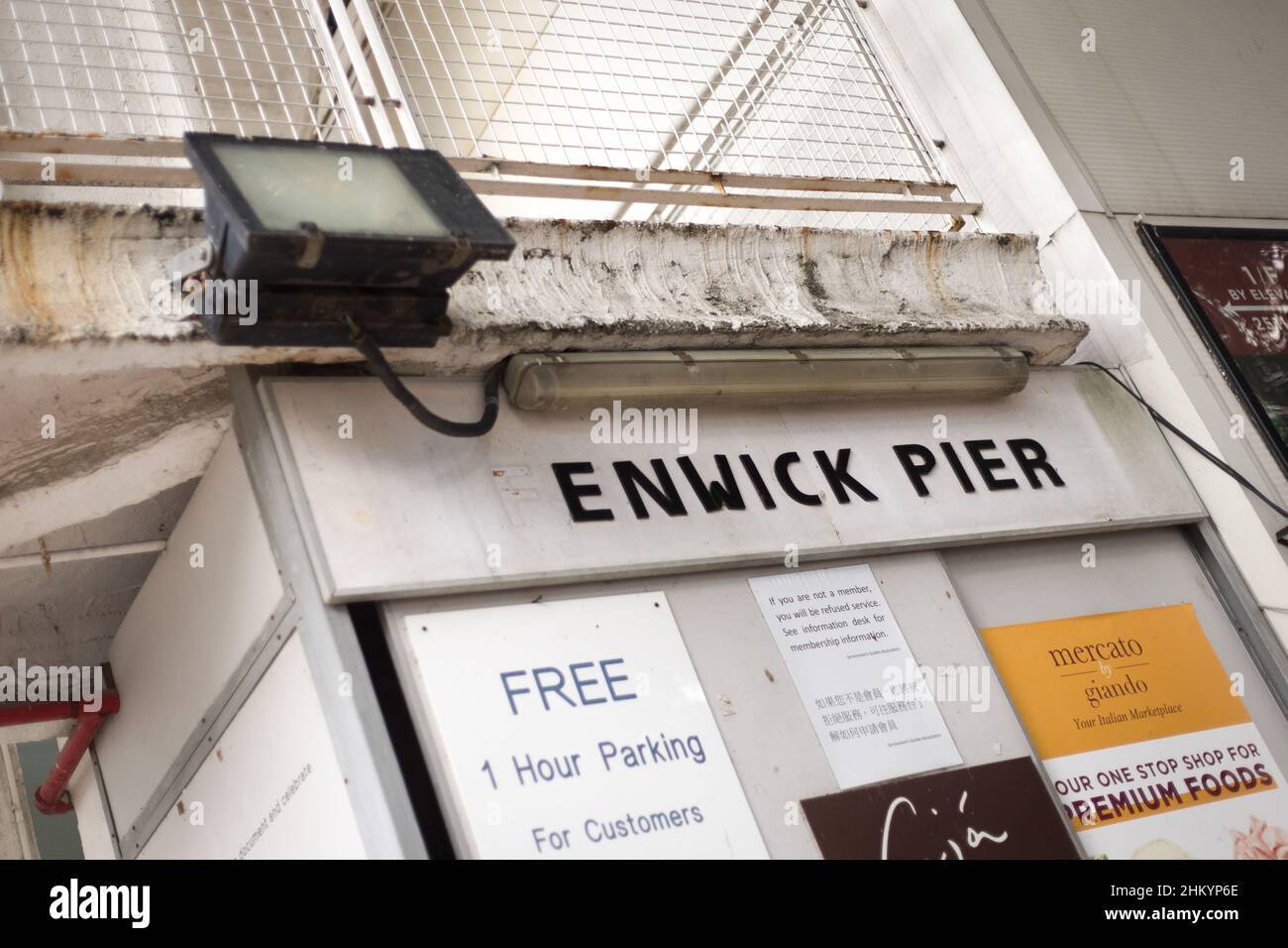 Signs seen outside Fleet Arcade, Fenwick Pier. The Fenwick Pier, with a ...