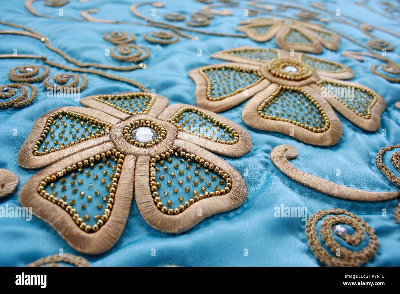 handmade embroidery on silk fabric Stock Photo - Alamy