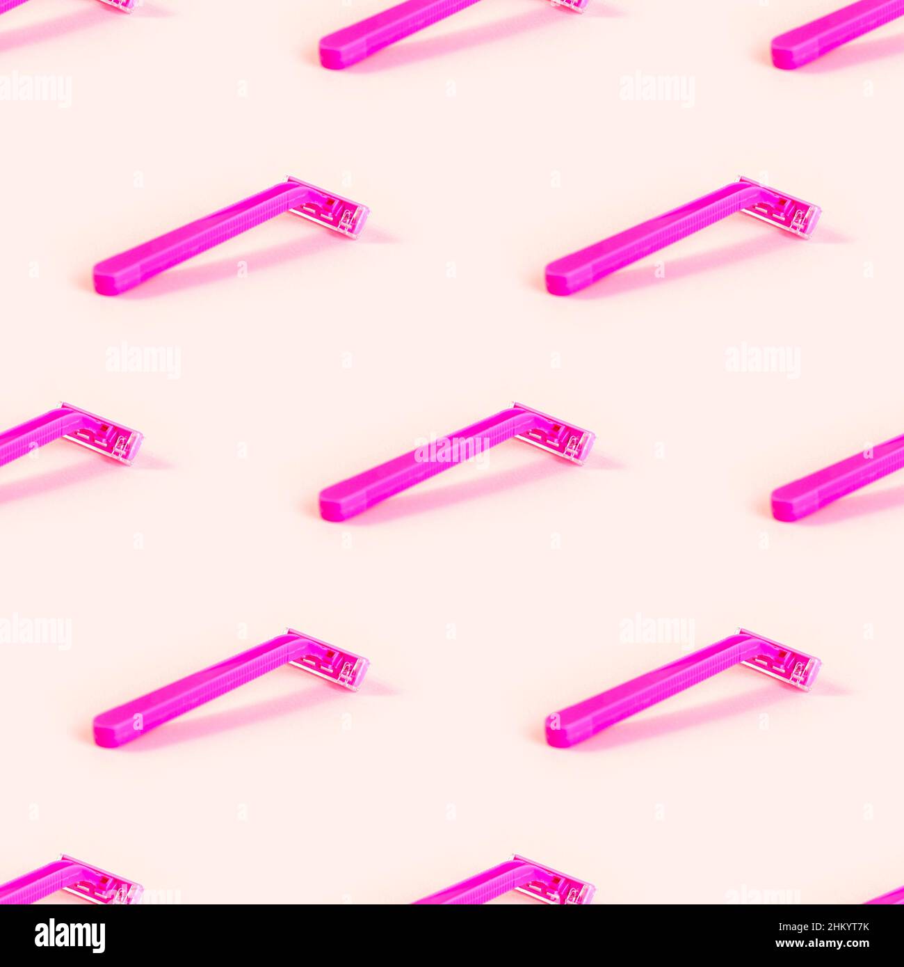 Pink disposable woman razor repeat seamless pattern on light pastel ...