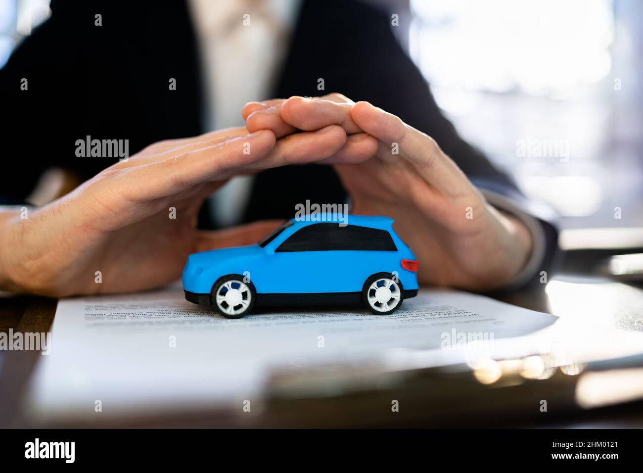 Miniature Toy Car Insurance And Guarantee. Vehicle Security Concept ...