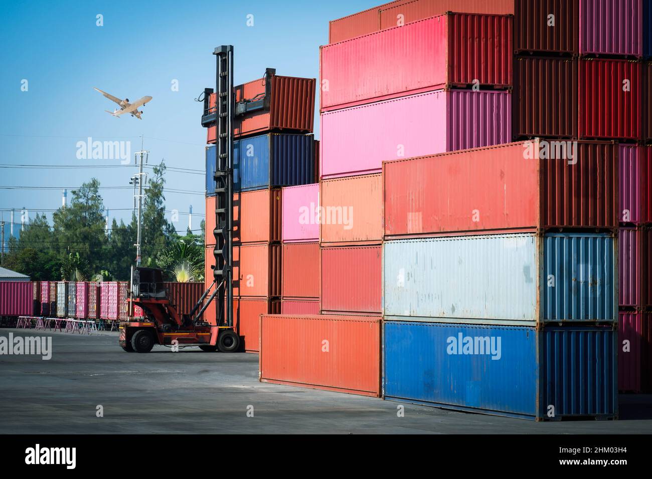 Container yard with container forklift Stock Photo - Alamy