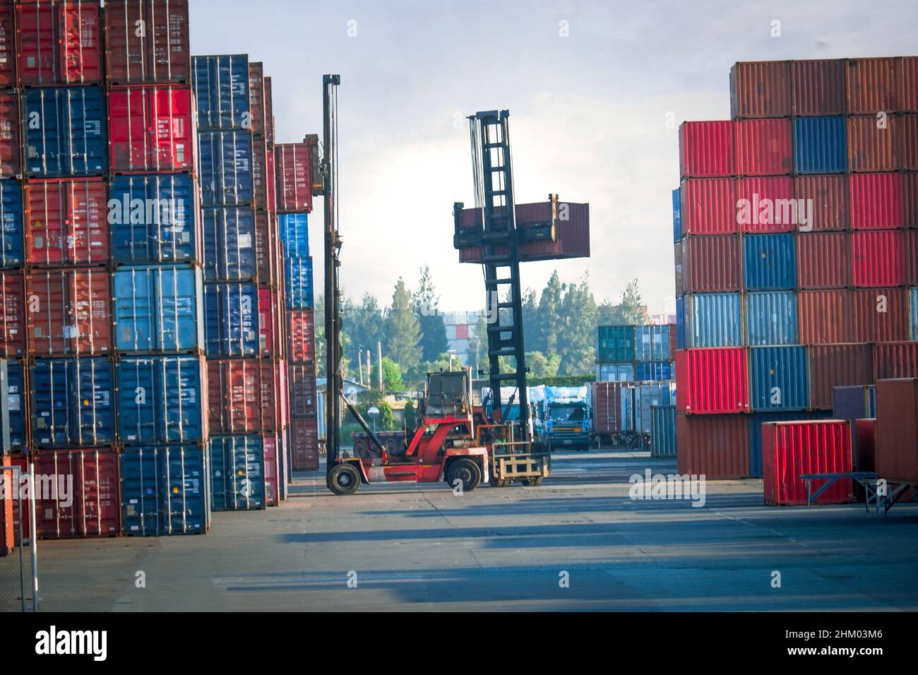 Container forklift working in port, cargo view Stock Photo - Alamy