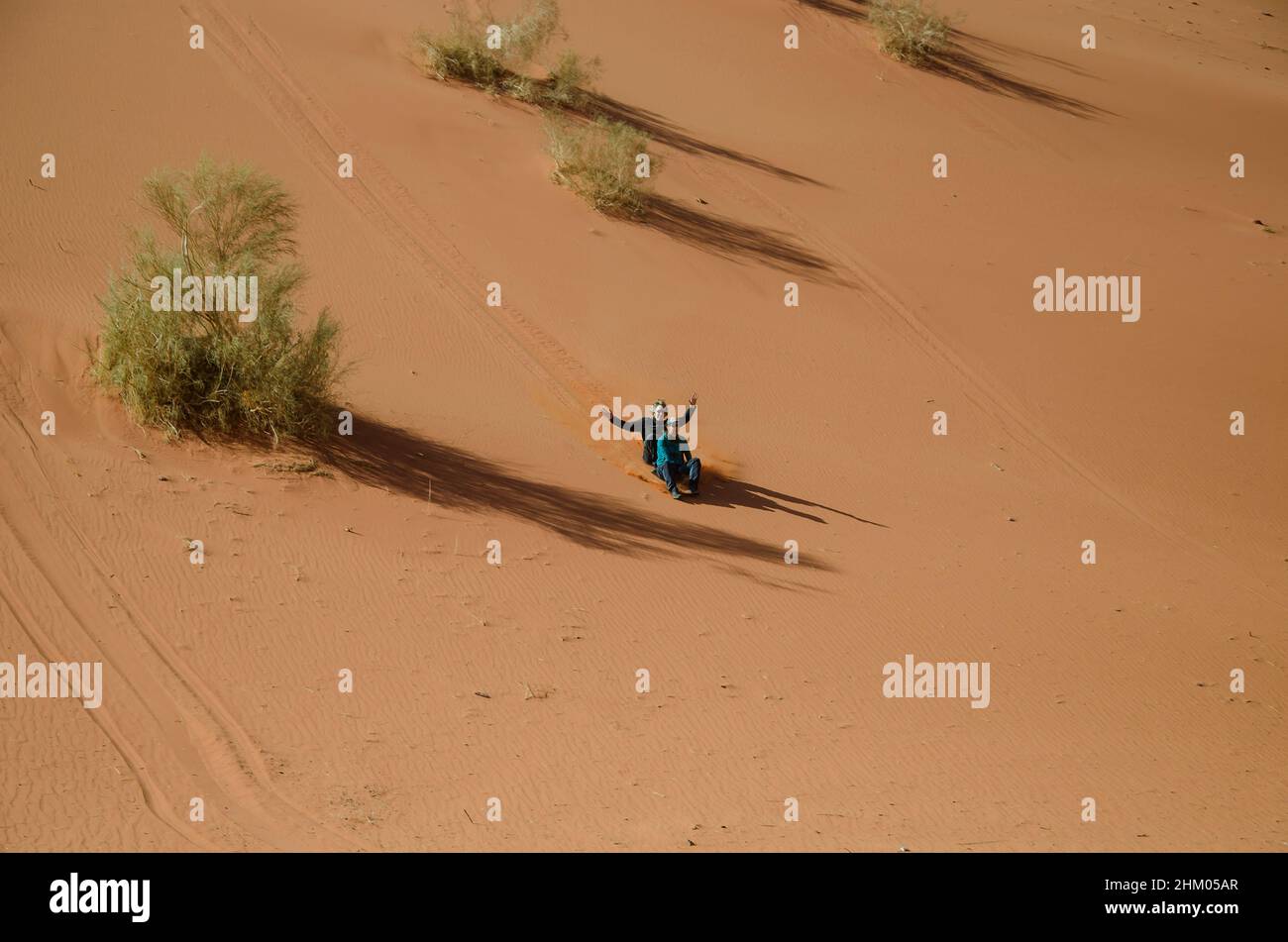 Sliding down sand dune hi-res stock photography and images - Alamy