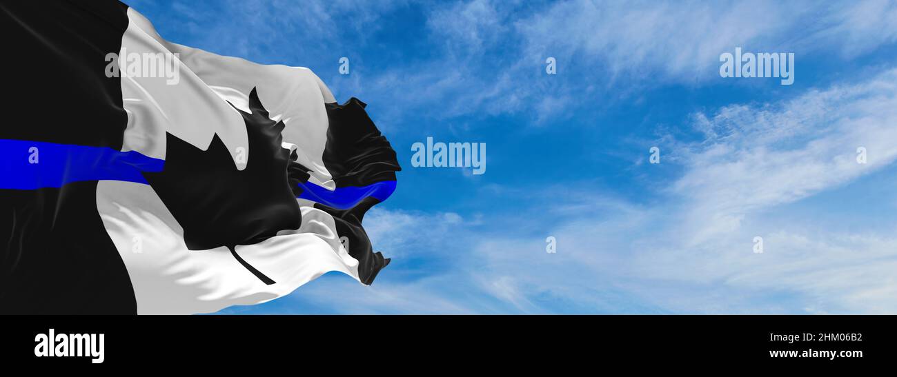Thin Blue Line, Canada flag waving at cloudy sky background on sunset ...