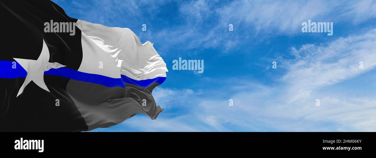 Thin Blue Line USA Texas flag waving at cloudy sky background on sunset ...