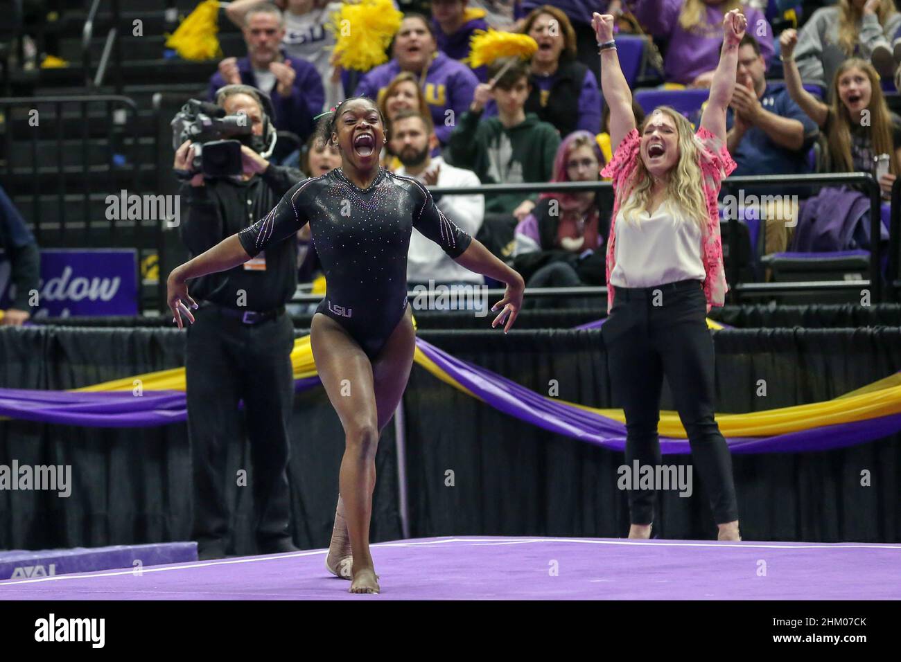February 05, 2022: LSU's Kiya Johnson smiles after landing a jump ...