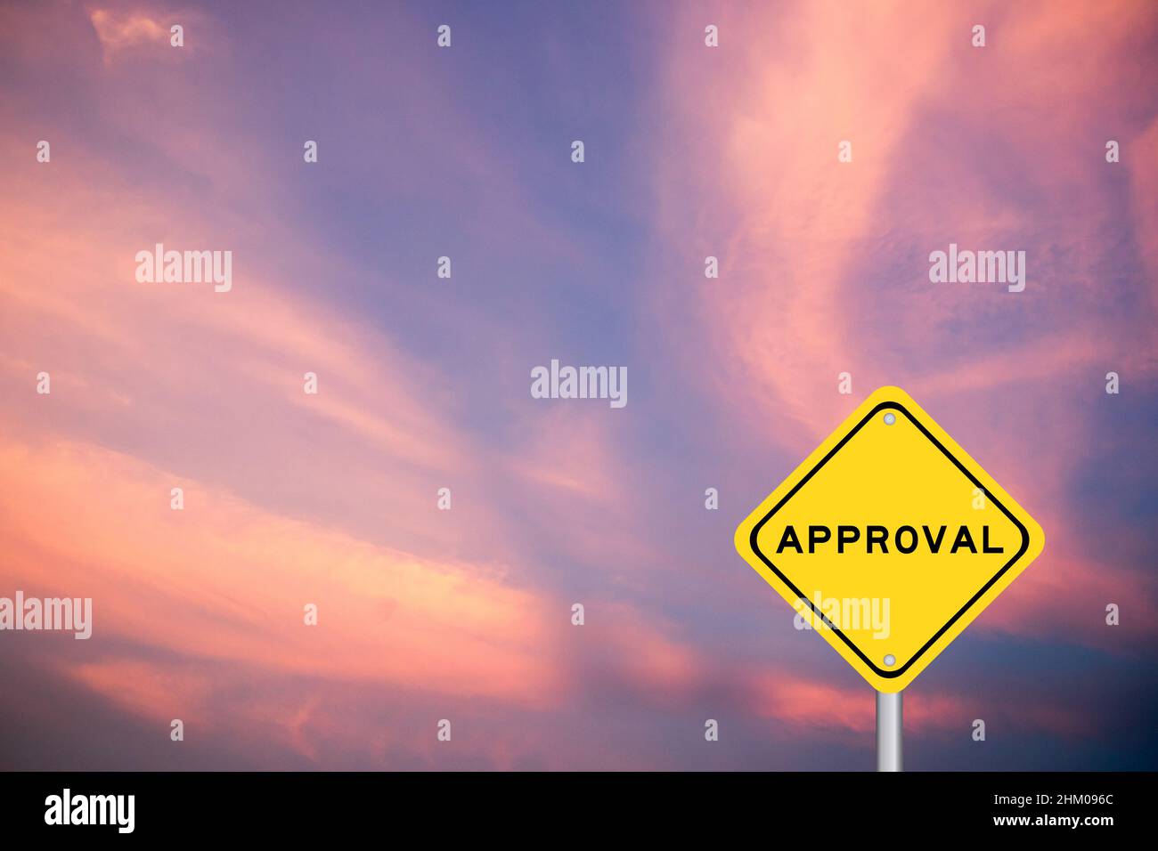 Yellow transportation sign with word approval on violet color sky ...