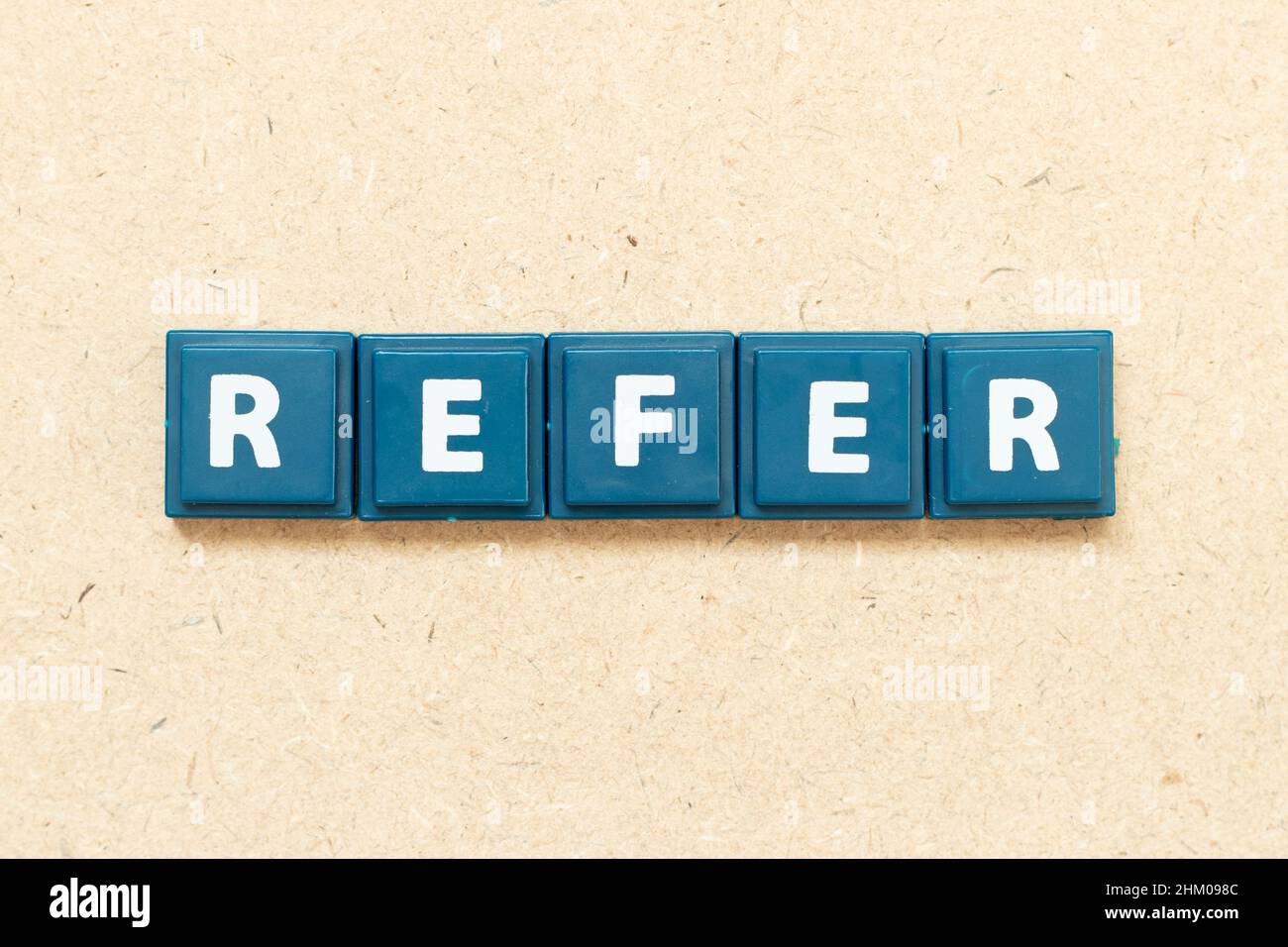 Tile alphabet letter in word refer on wood background Stock Photo - Alamy