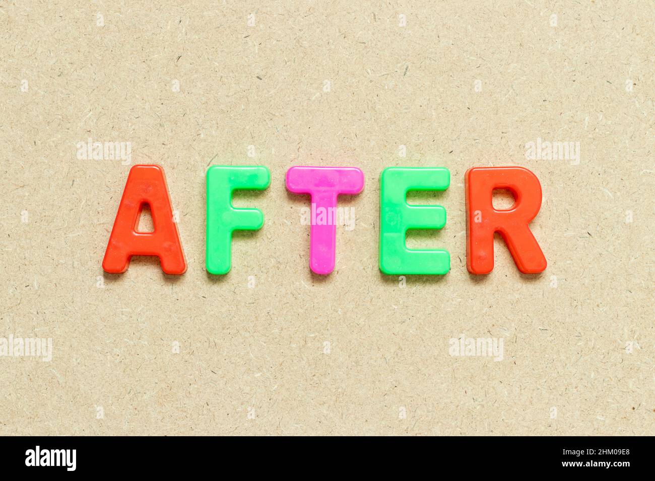 Color alphabet letter with word after on wood background Stock Photo - Alamy