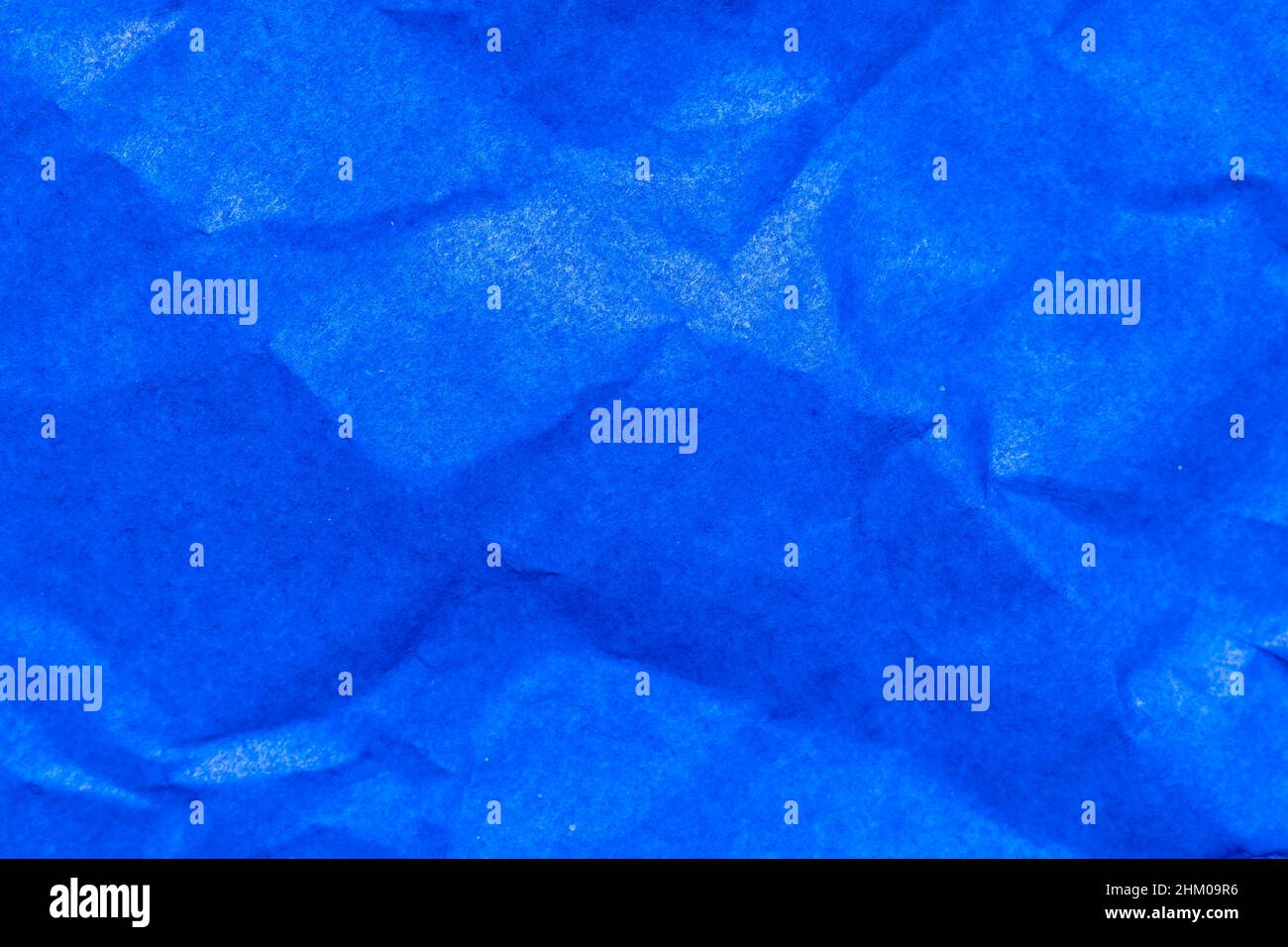 Grunge wrinkled blue color paper textured background Stock Photo - Alamy
