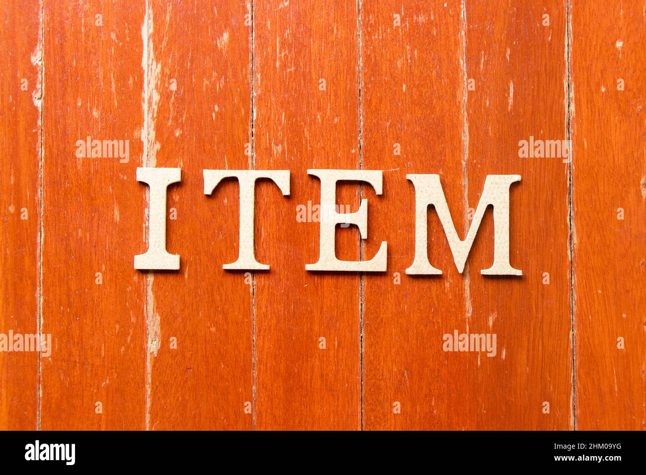 Alphabet letter in word item on old red color wood plate background ...