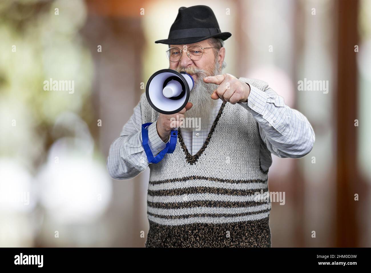 Elderly speaking serious hi-res stock photography and images - Alamy