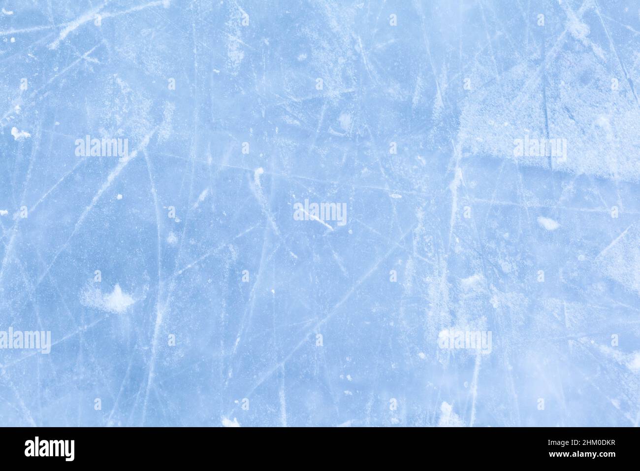 Empty ice rink with skate marks after the session outdoor. skating ice ...