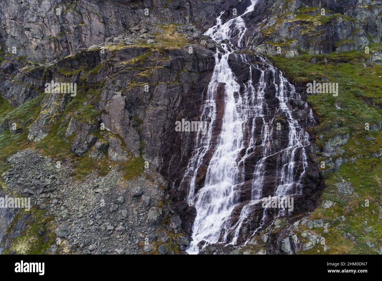 Waterfall on steep mountain side Stock Photo - Alamy