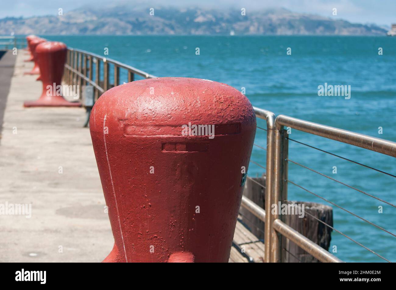 Large metal ship's pylons on a pier at fort mason on san francisco bay in sunny california Stock ...