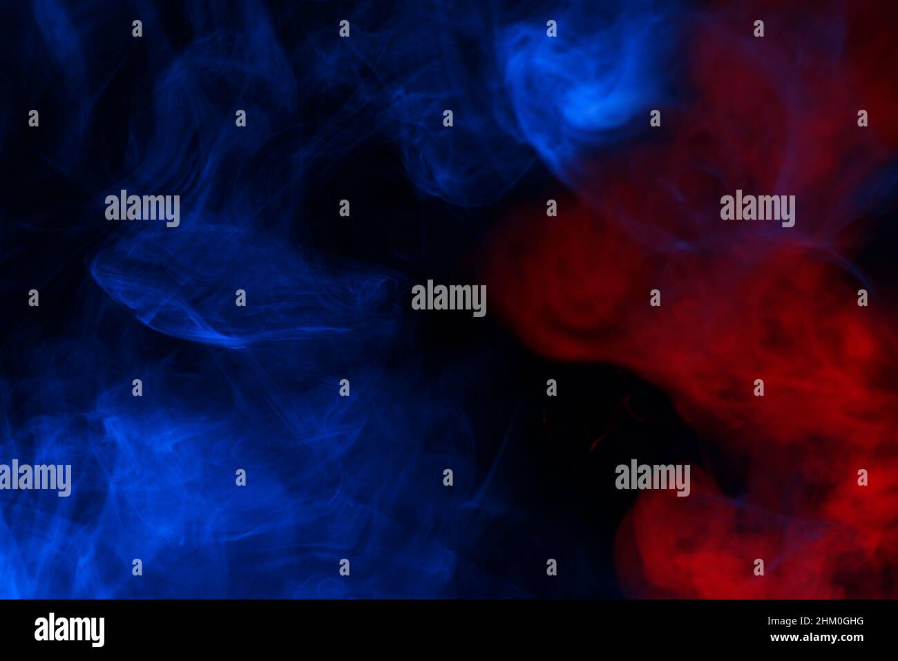 Blue steam on a black background. Copy space Stock Photo - Alamy