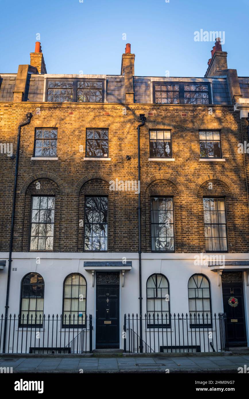 Townhouses on church square hi-res stock photography and images - Alamy