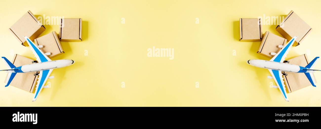 Airplane and stack of cardboard boxes. concept of air cargo and parcels ...