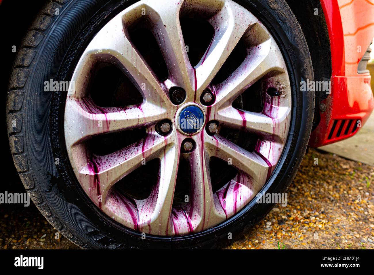 Woodbridge, Suffolk, UK February 24 2021: A closeup of a car wheel ...