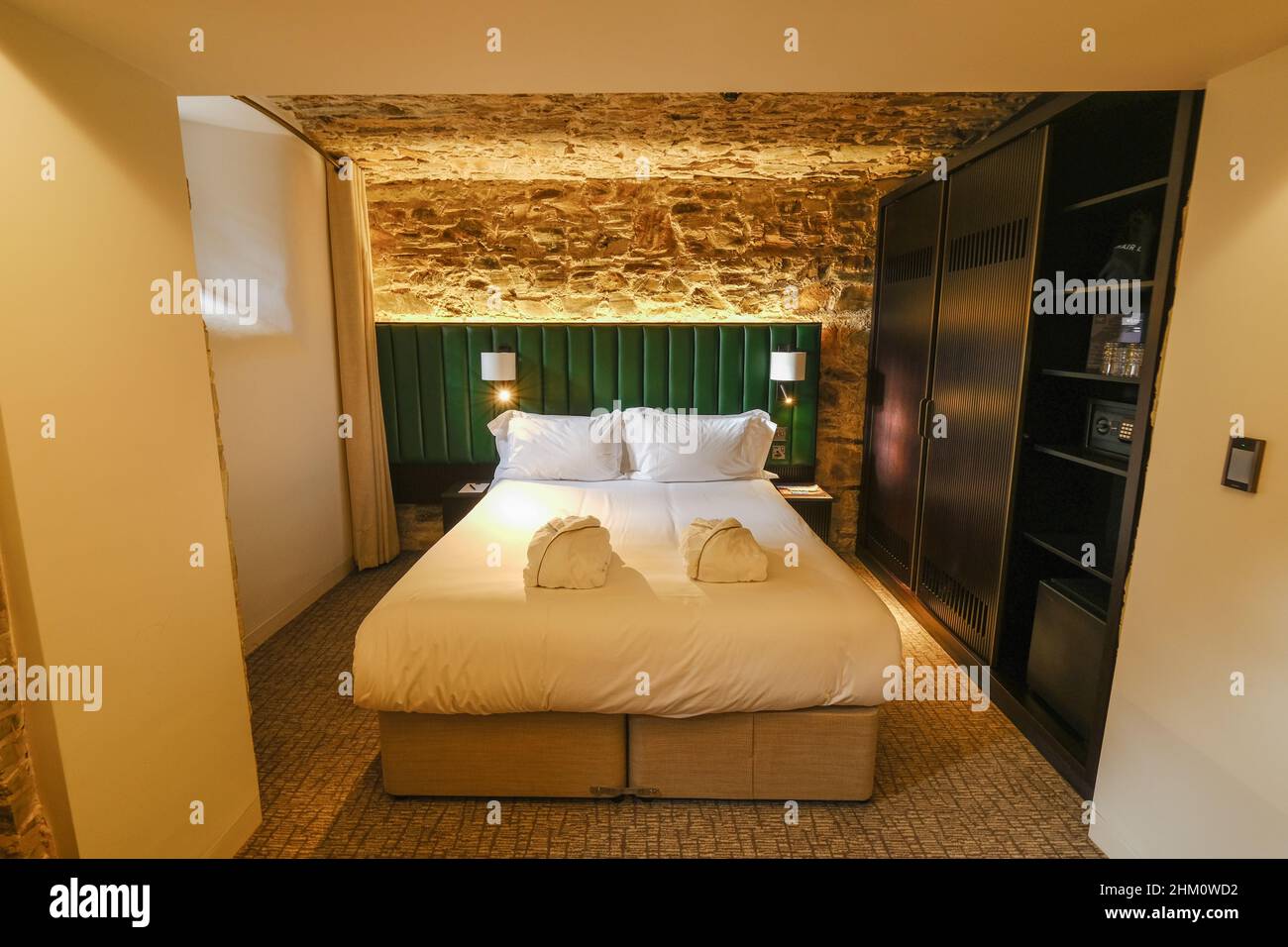 A bedroom interior at Bodmin Jail Hotel in Cornwall Stock Photo - Alamy