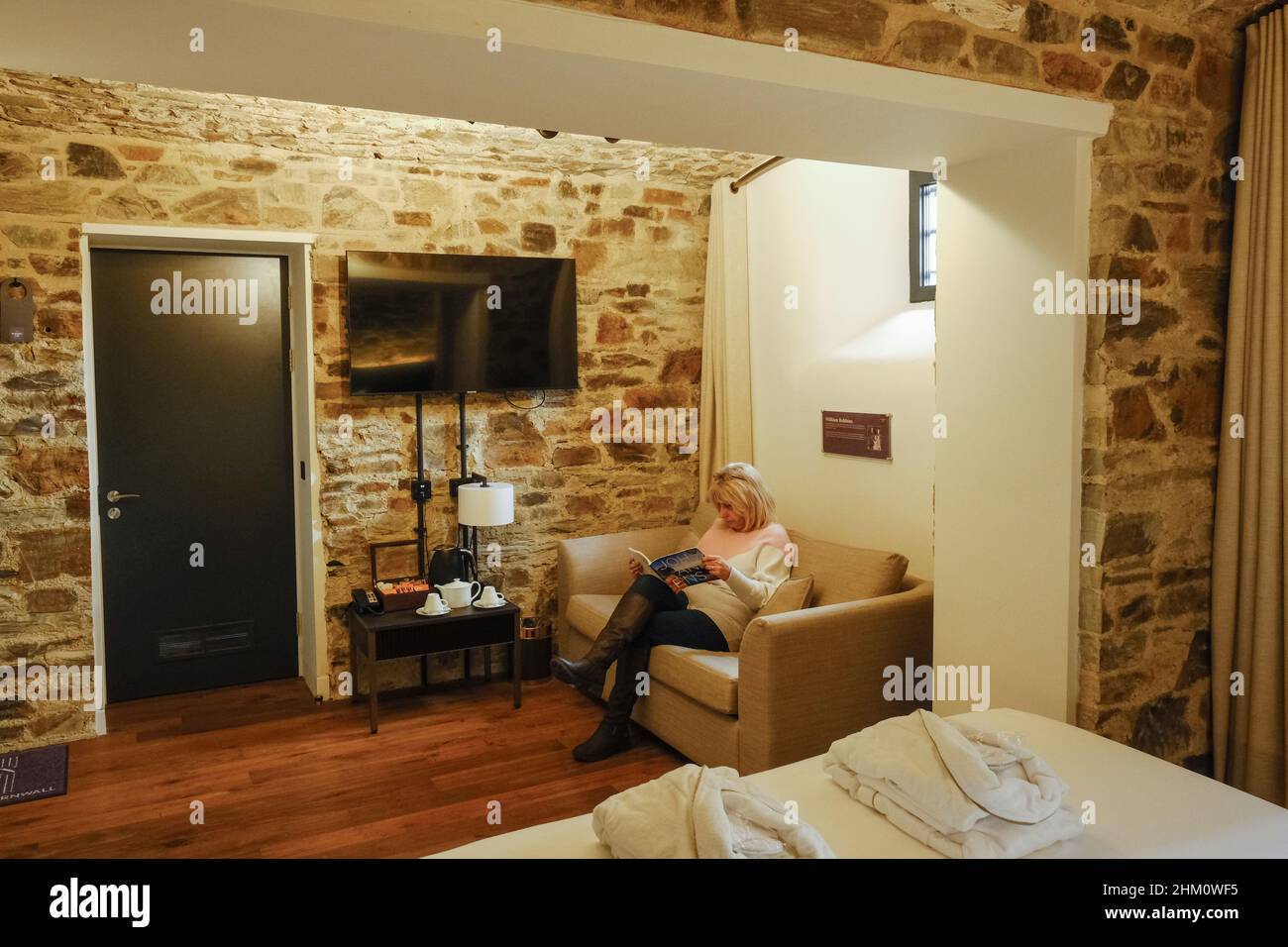A bedroom interior at Bodmin Jail Hotel in Cornwall Stock Photo - Alamy