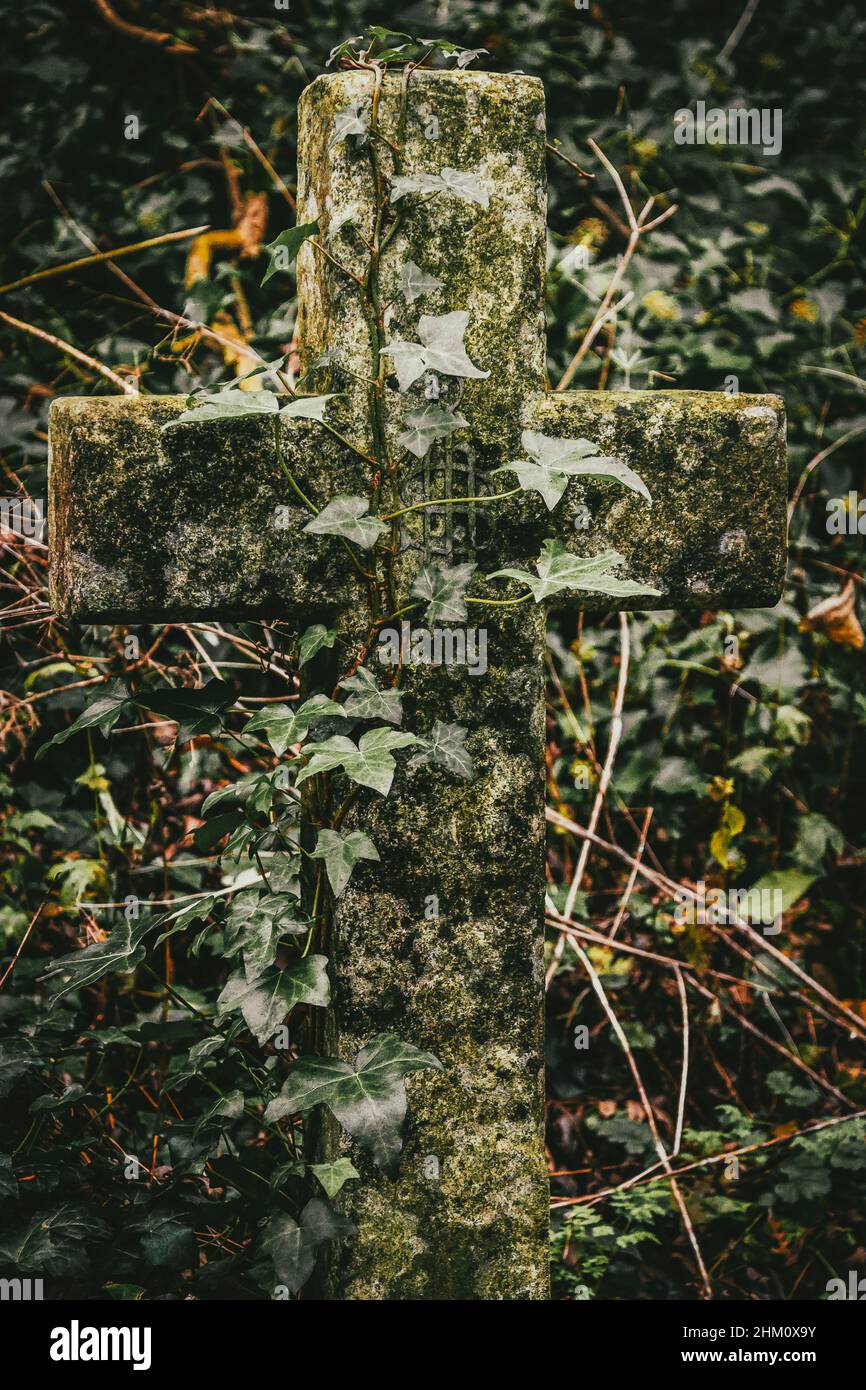 Dilapidated overgrown gravestone, Nunhead Cemetery, London, England, UK ...