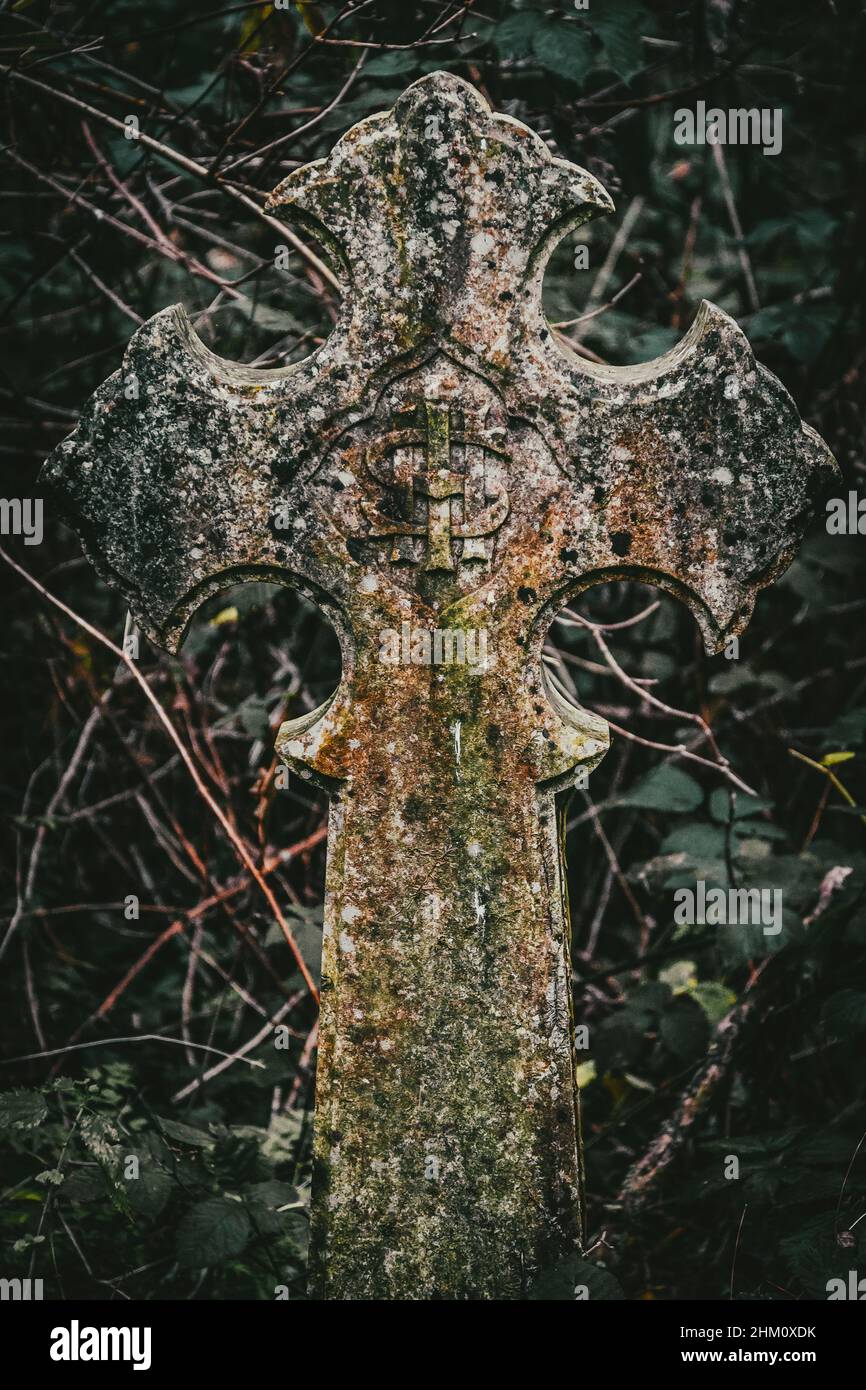 Dilapidated overgrown gravestone, Nunhead Cemetery, London, England, UK ...