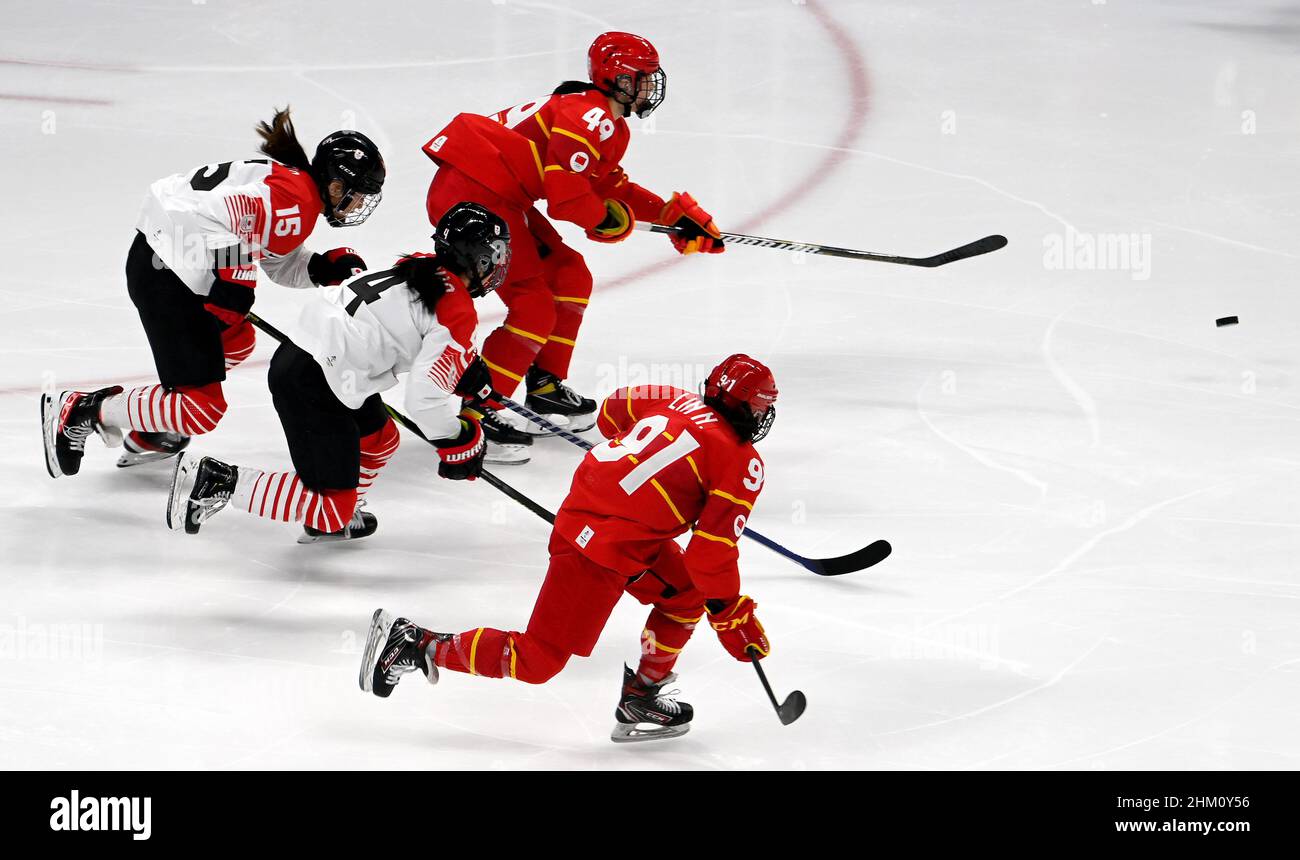 Beijing, China. 6th Feb, 2022. Wang Yuting (2nd R) vies for the ball ...