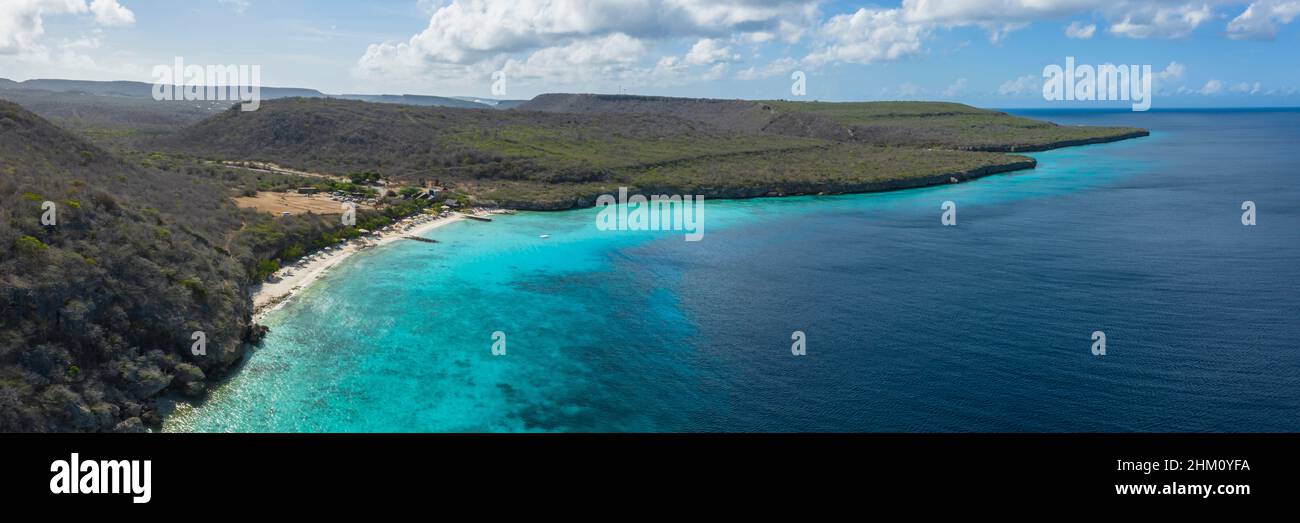 Aerial view of coast scenery with the ocean, cliff, and beach around ...
