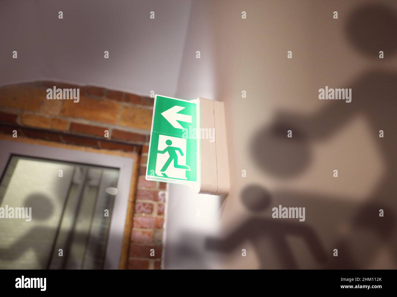 panic in the building and evacuation through an emergency exit Stock ...