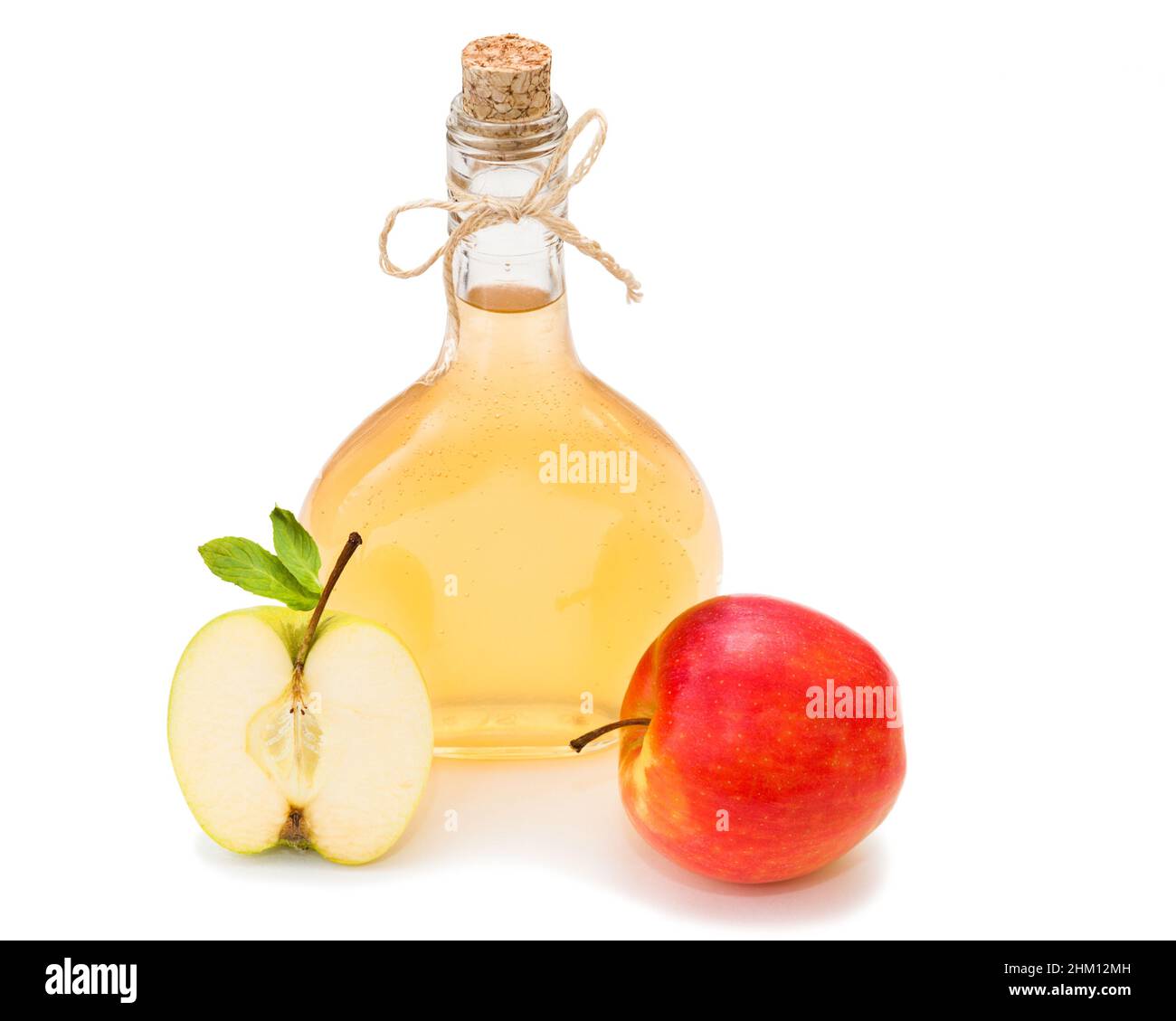 Homemade fermented apple vinegar isolated on white Stock Photo - Alamy