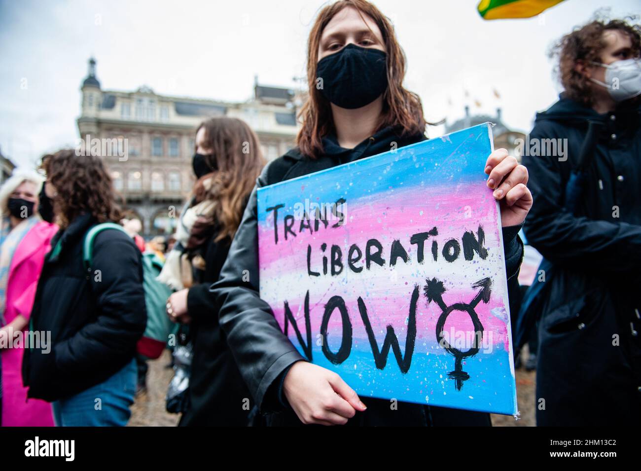 A protester holds a placard during the demonstration.The organization ...