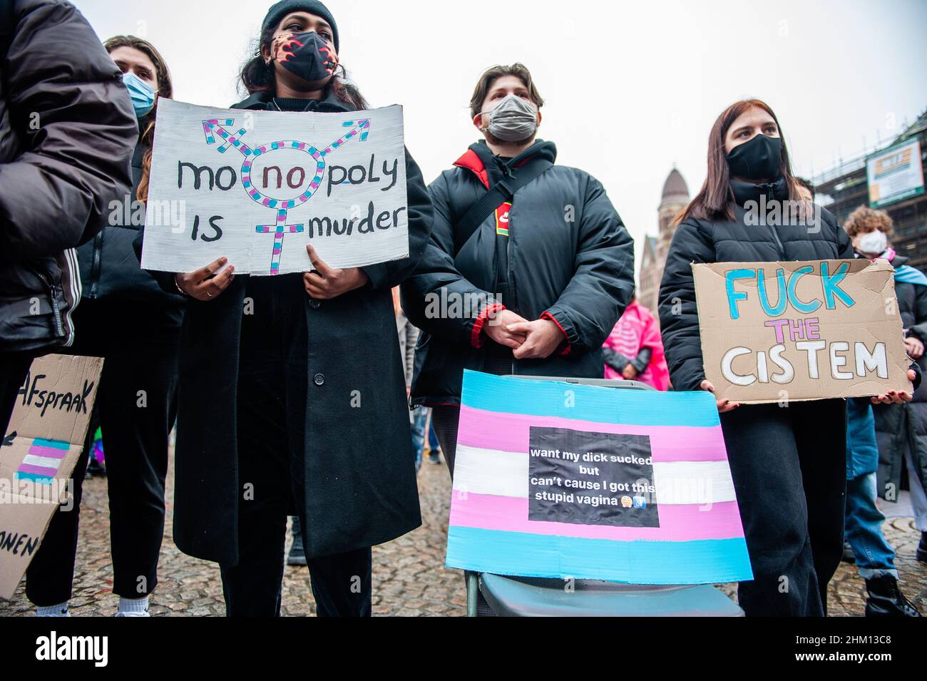 Protesters hold placards during the demonstration.The organization ...