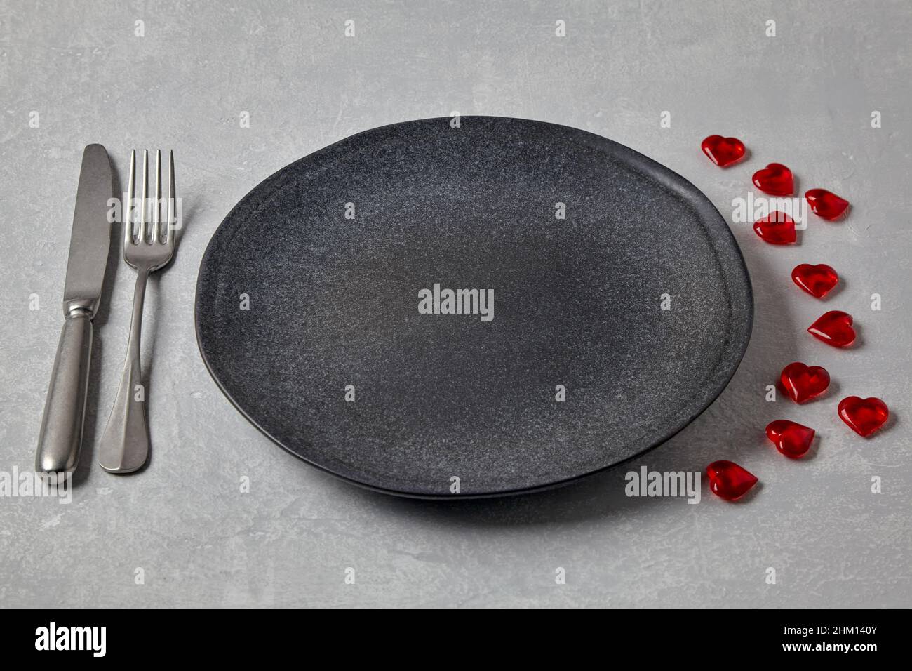 Empty dark plate cutlery hi-res stock photography and images - Alamy