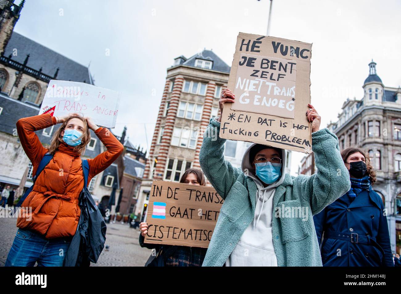 Protesters hold placards during the demonstration.The organization ...