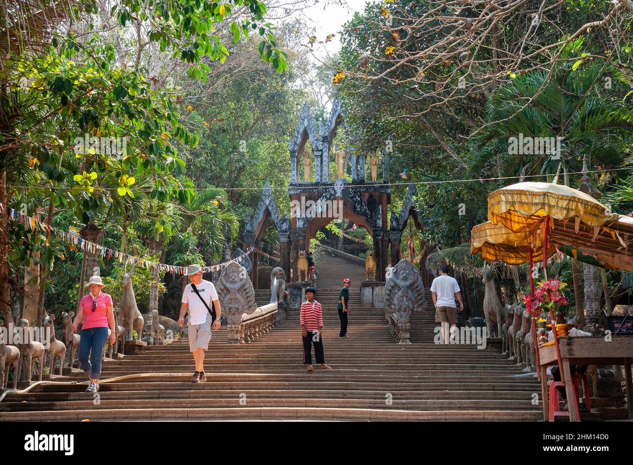 Phnom Kulen, Cambodia - February, 2013: Tourists visit Wat Preah Ang ...