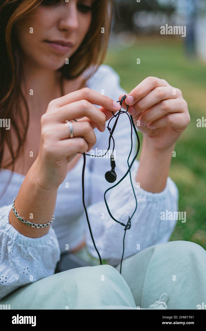 Untangling headphones hi-res stock photography and images - Alamy