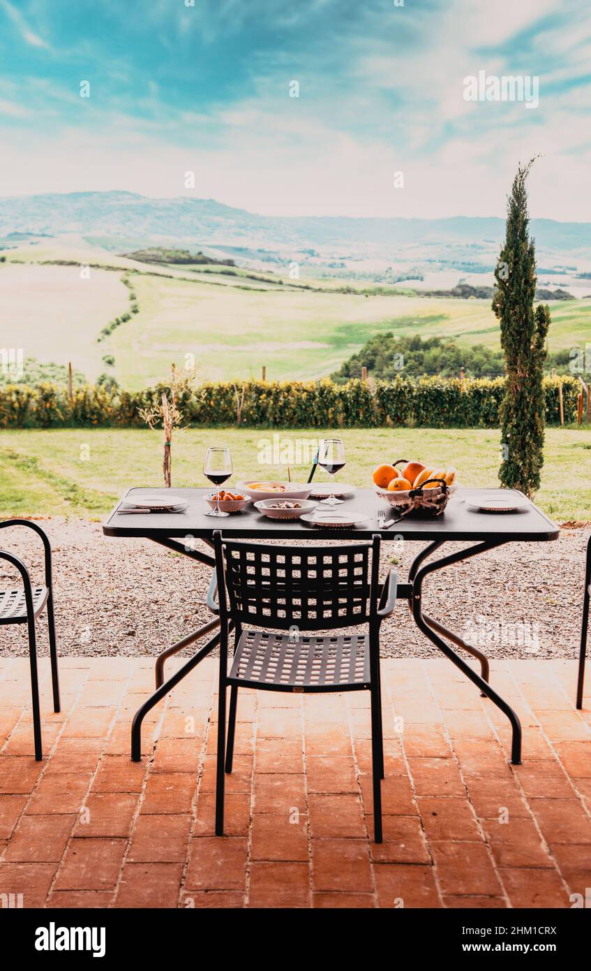lunch with a view - table against beautiful landscape in Tuscany Stock ...
