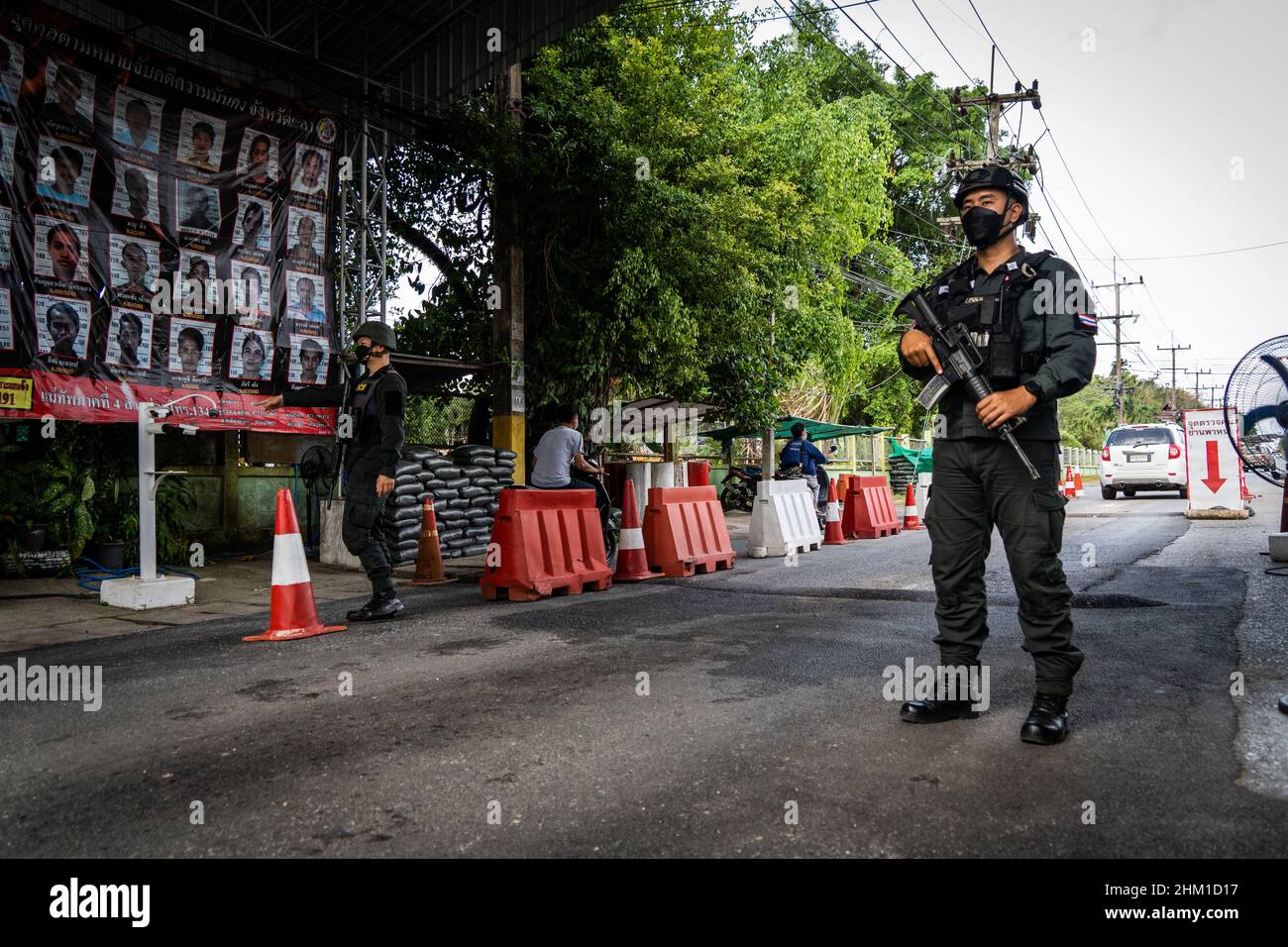 Yala, Thailand. 07th Feb, 2022. An armed policeman works at an entry ...