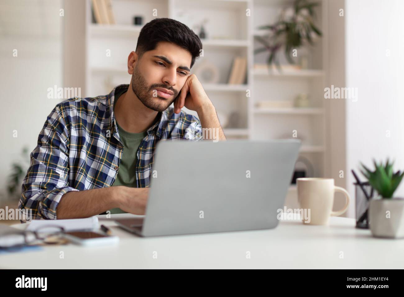 Exhausted remote worker hi-res stock photography and images - Alamy