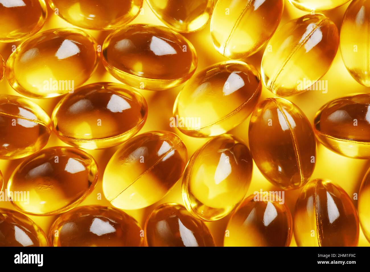 The texture of the capsules in the shell with liquid vitamin D3 in full ...