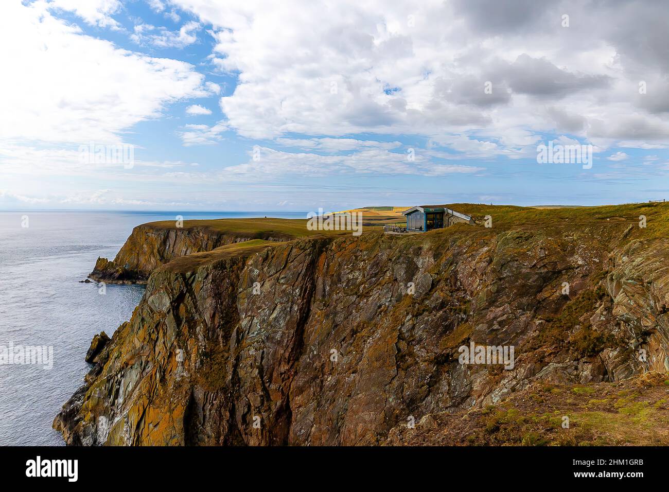A small restaurant on the edge of a high cliff Stock Photo - Alamy