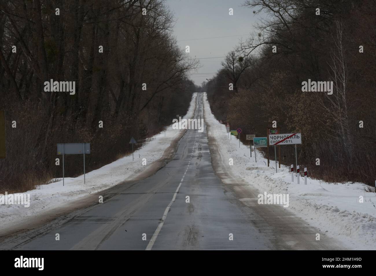 Chernobyl Exclusion Zone, Ukraine. 6th Feb, 2022. The P 56 road leaving ...