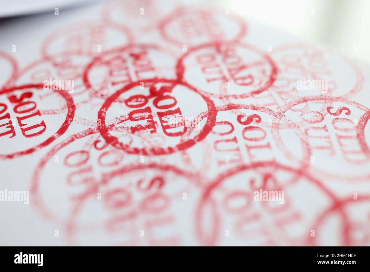 Red stamp sold out on white background Stock Photo - Alamy